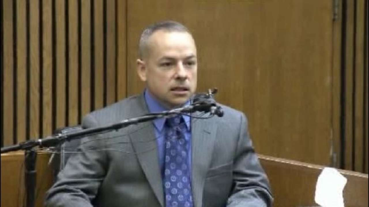 Detroit police officer Joseph Weekley testifies in his own...